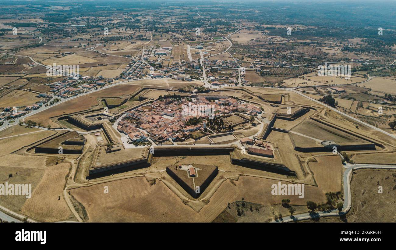 An aerial of Castell de Sant Ferran castle clear sunlit sky background ...