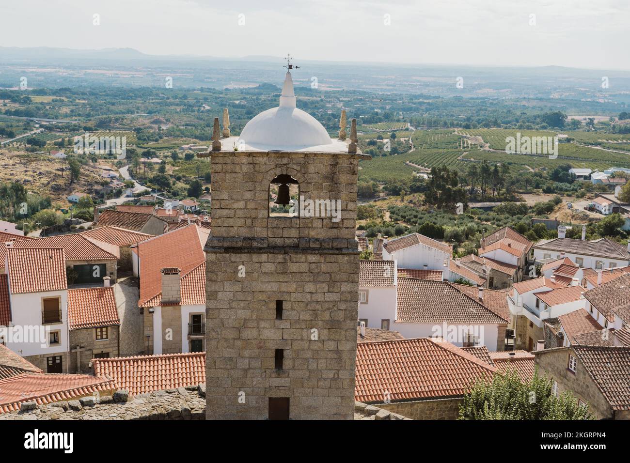 A low-angle of Castel Novo sunlit cloudy sky cityscape background ...