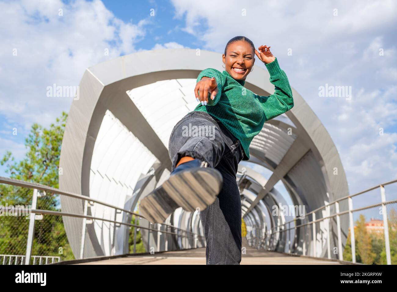 Dancing pointing woman hi-res stock photography and images - Alamy