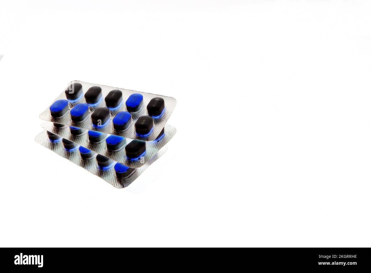 The tablet pills isolated on a white background in inverted color Stock ...
