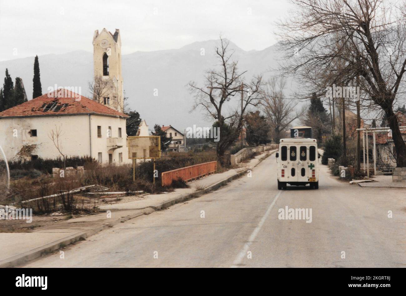 A British ambulance carrying humanitarian aid to Sarajevo passes ...