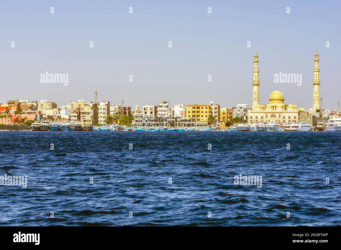 Egypt, Red Sea Governorate, Hurghada, View of coastal city with mosque ...