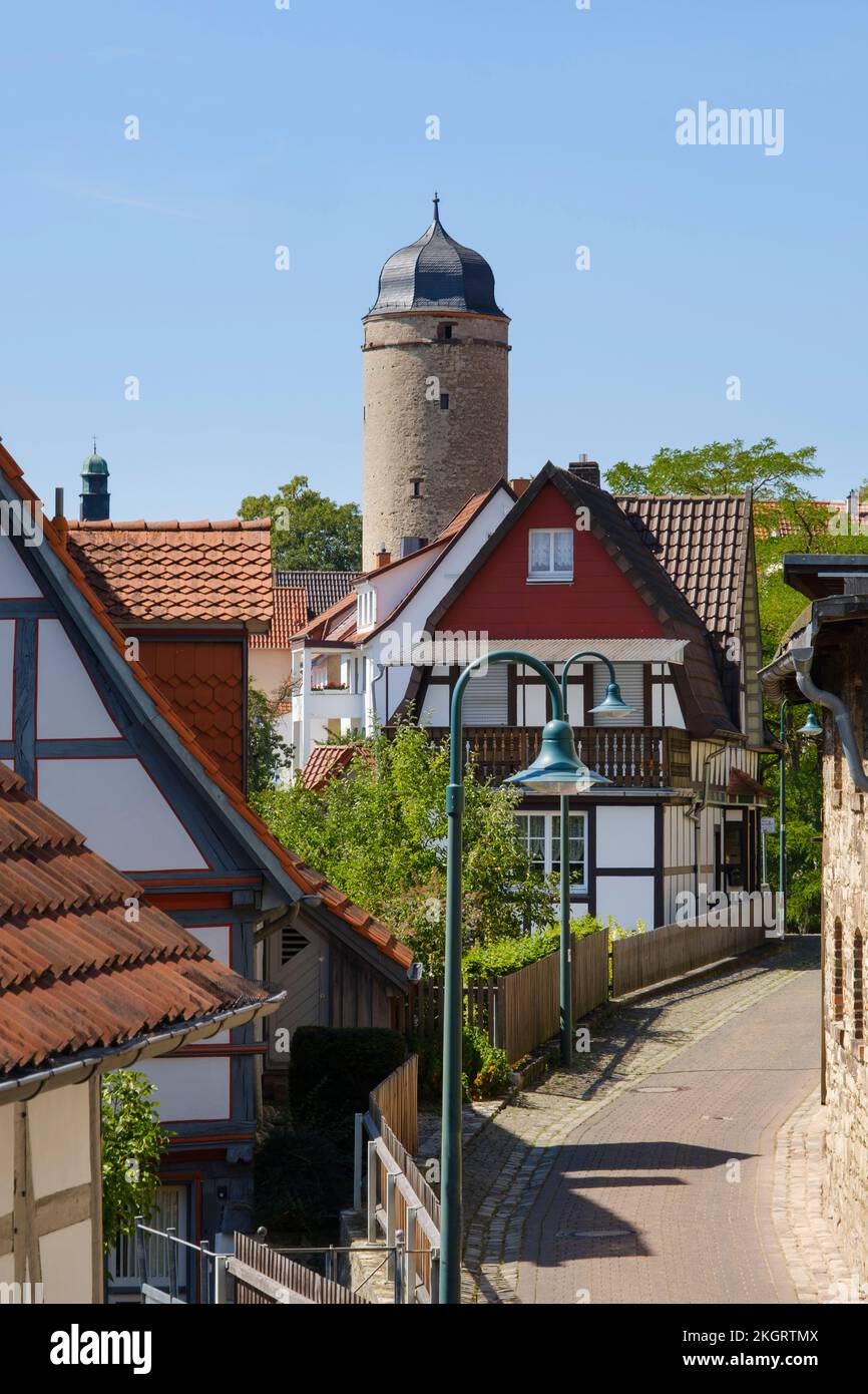 Germany, North Rhine-Westphalia, Warburg, Old town alley with city gate ...