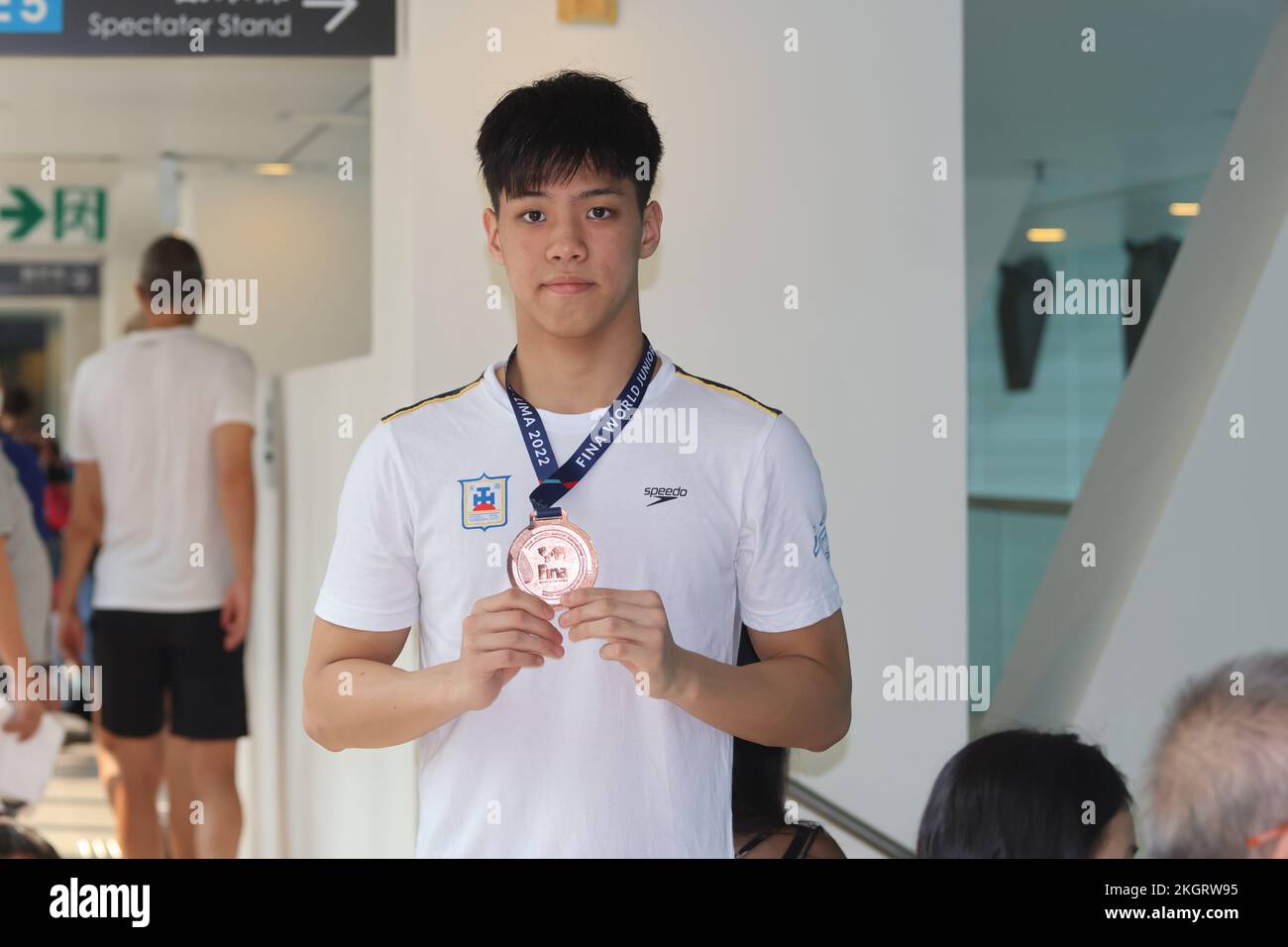 Swimmer Adam Mak Sai-ting with his World Junior bronze medal. Photo ...