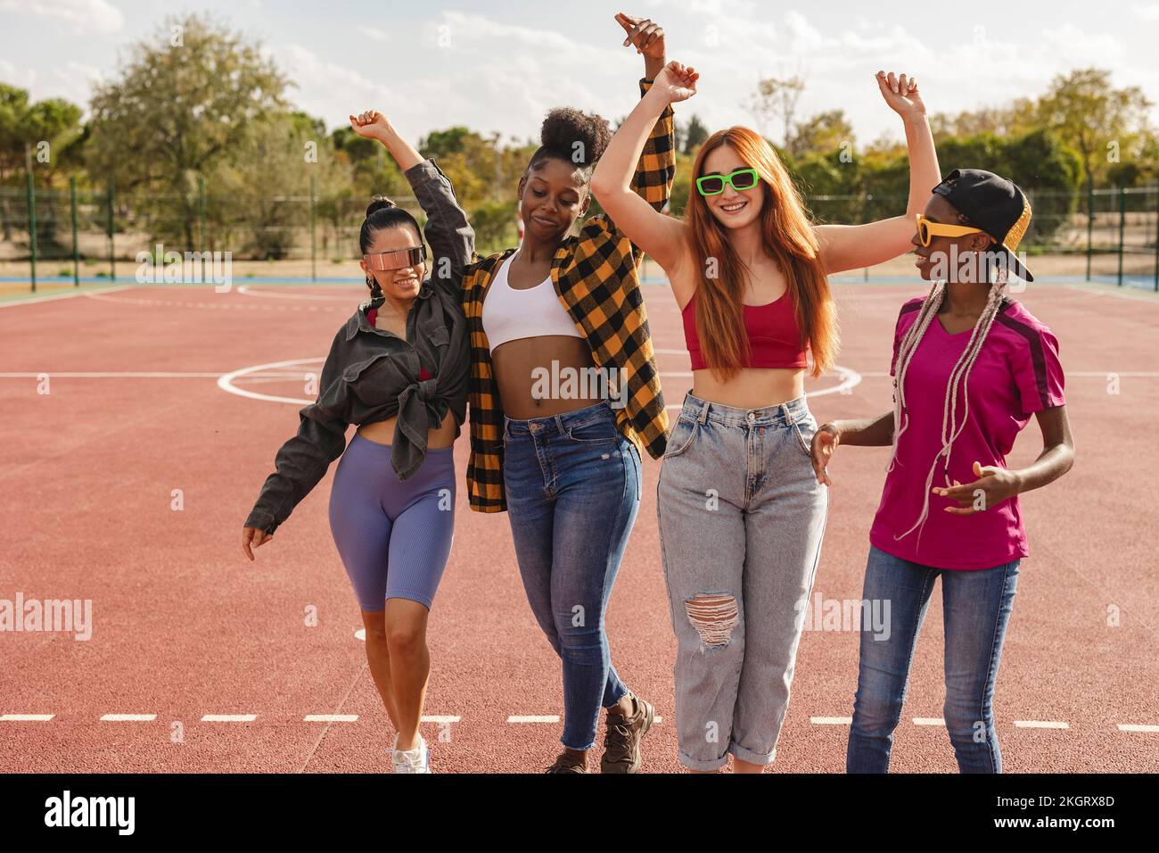 Group cheerful friends raising hi-res stock photography and images - Alamy