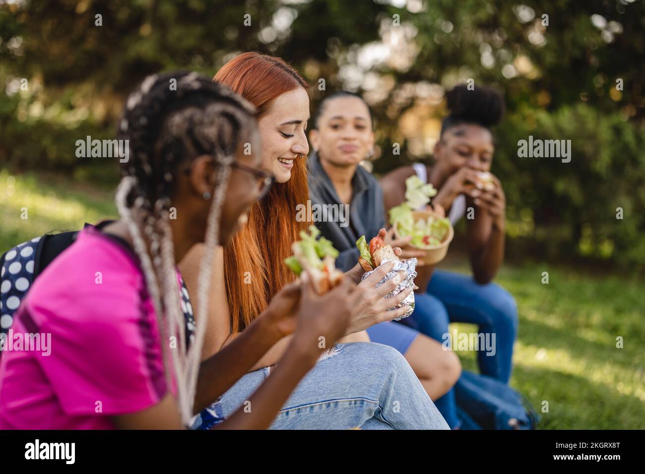 Eating snack park hi-res stock photography and images - Alamy