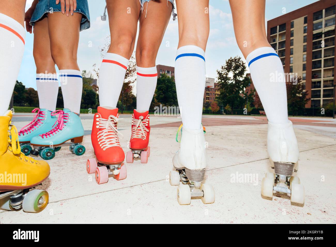 Legs of women wearing roller skates at sports court Stock Photo - Alamy
