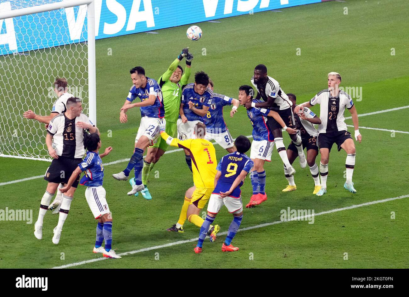 Japan goalkeeper Shuichi Gonda punches the ball clear as Germany ...
