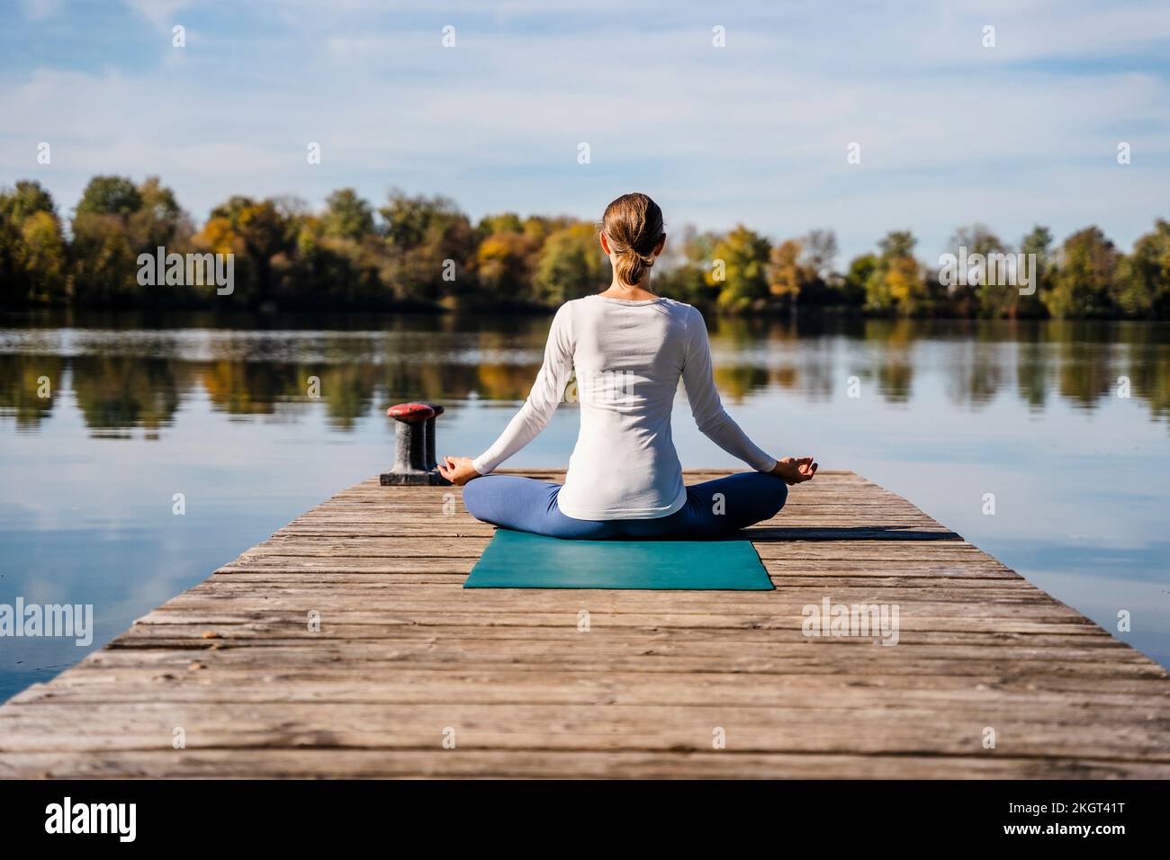 Female meditating lake hi-res stock photography and images - Alamy