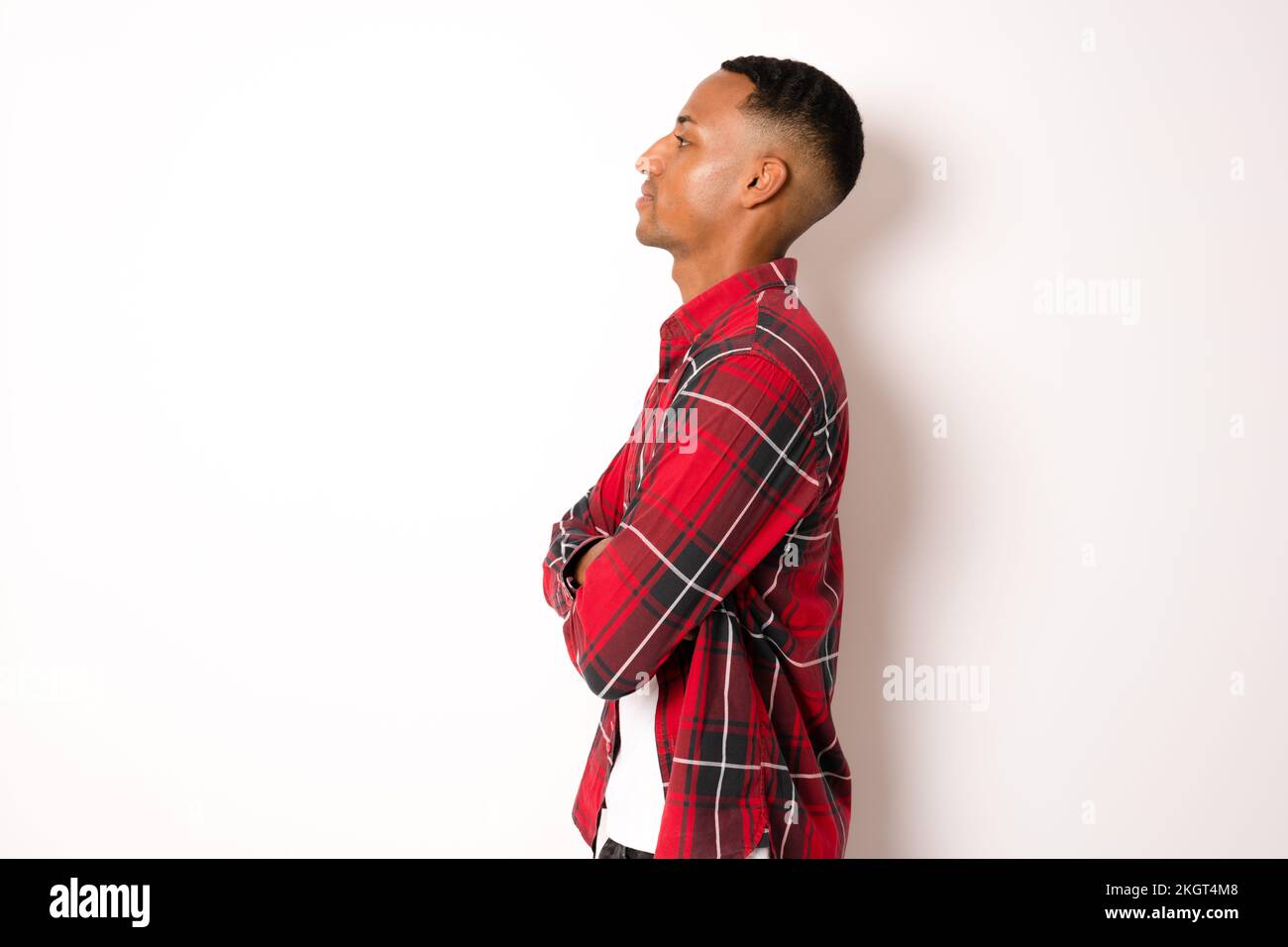 african american man standing in profile isolated on blank white studio ...