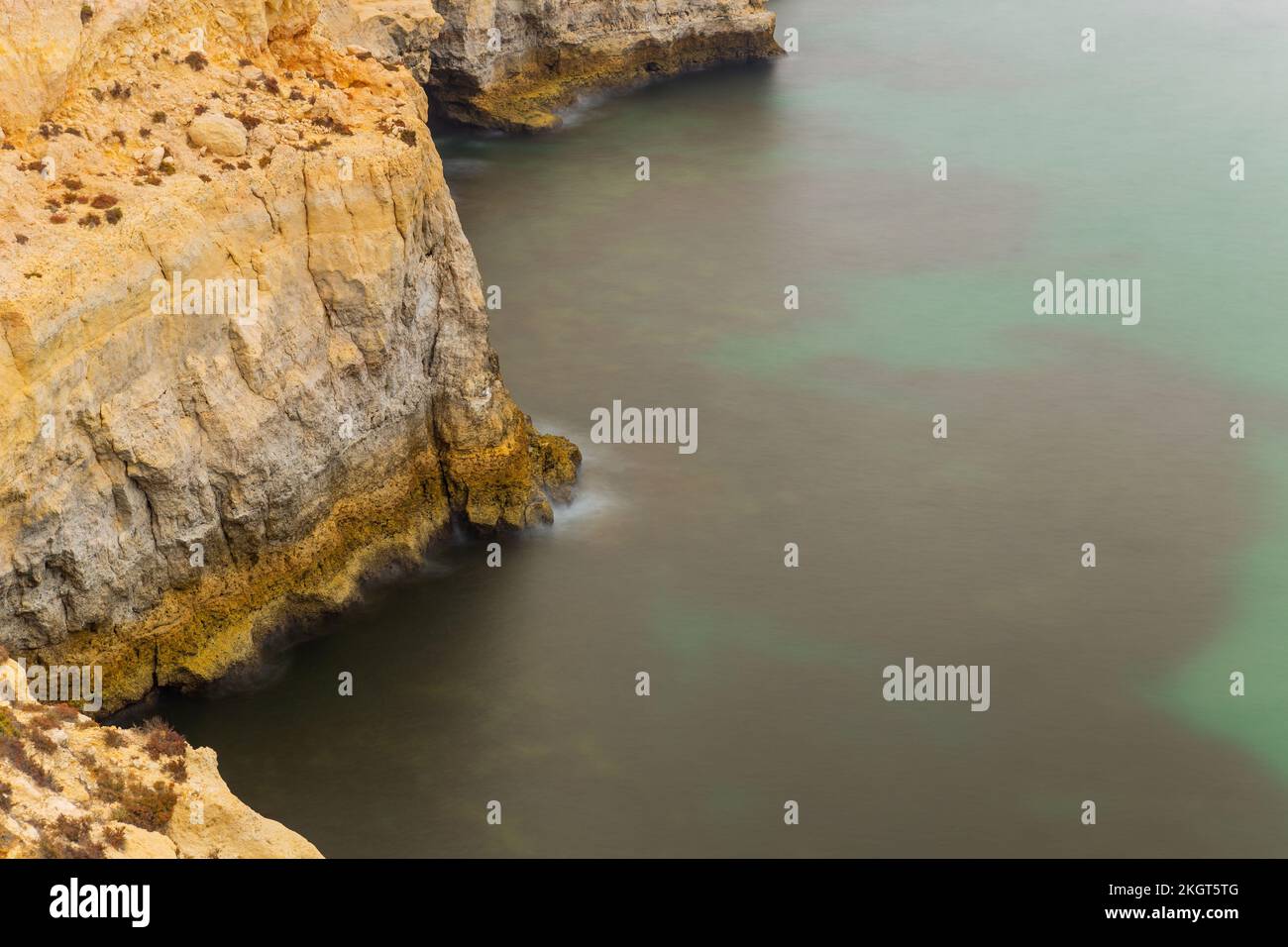 The famous coastline of Algarve in Portugal with Sandstone Cliffs ...