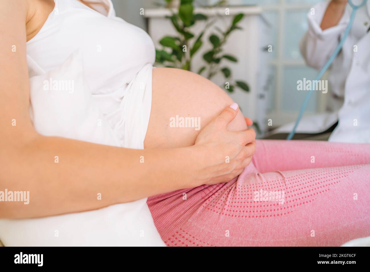 Two woman belly hi-res stock photography and images - Alamy