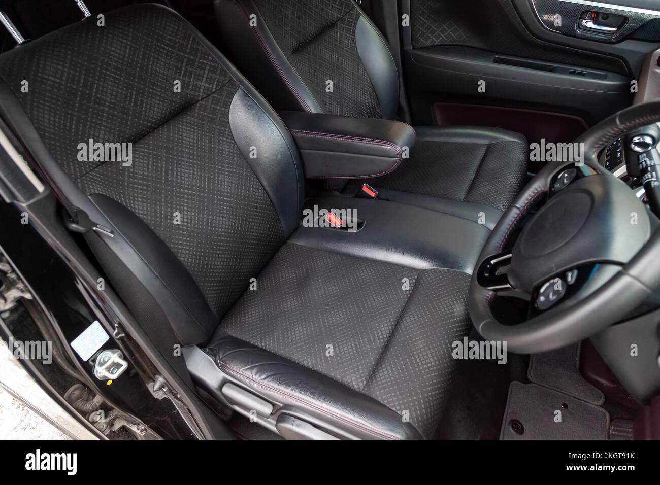 Clean after washing the front seats of leather and fabric trim inside ...