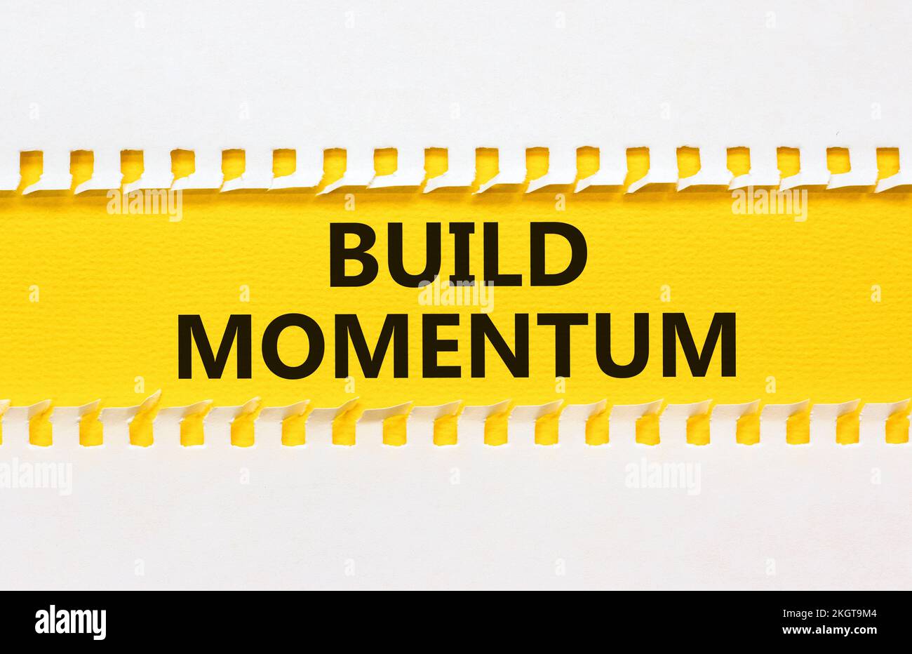 Build momentum symbol. Concept words Build momentum on yellow paper ...
