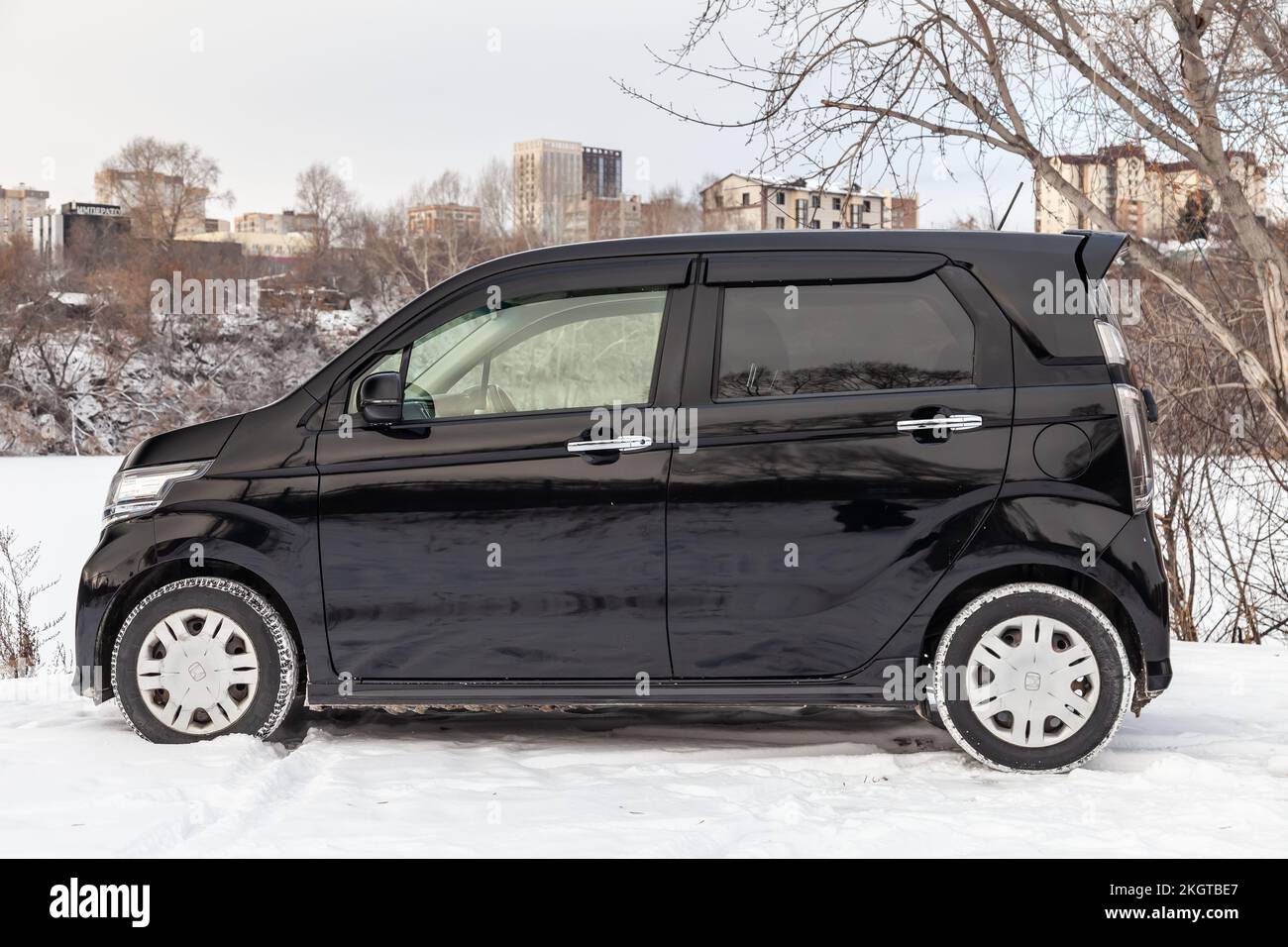 Novosibirsk, Russia - 11.20.2022: Side view of black Honda N-Wgn Custom ...