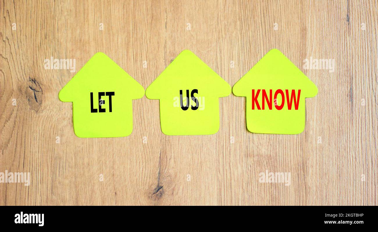 Let us know symbol. Concept words Let us know on green paper house on a ...