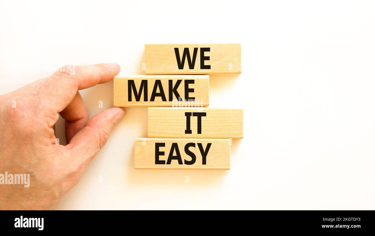 We make it easy symbol. Concept words We make it easy on wooden cubes ...