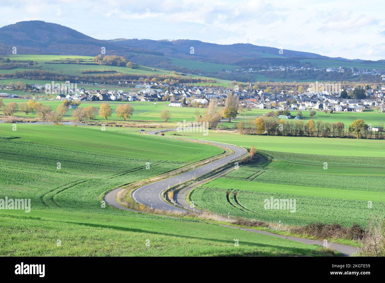 curvy country road in the Eifel during autumn Stock Photo - Alamy