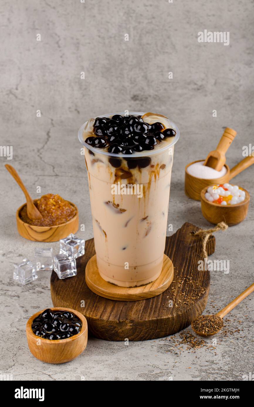 Boba or tapioca pearls is taiwan bubble milk tea in plastic cup with ...