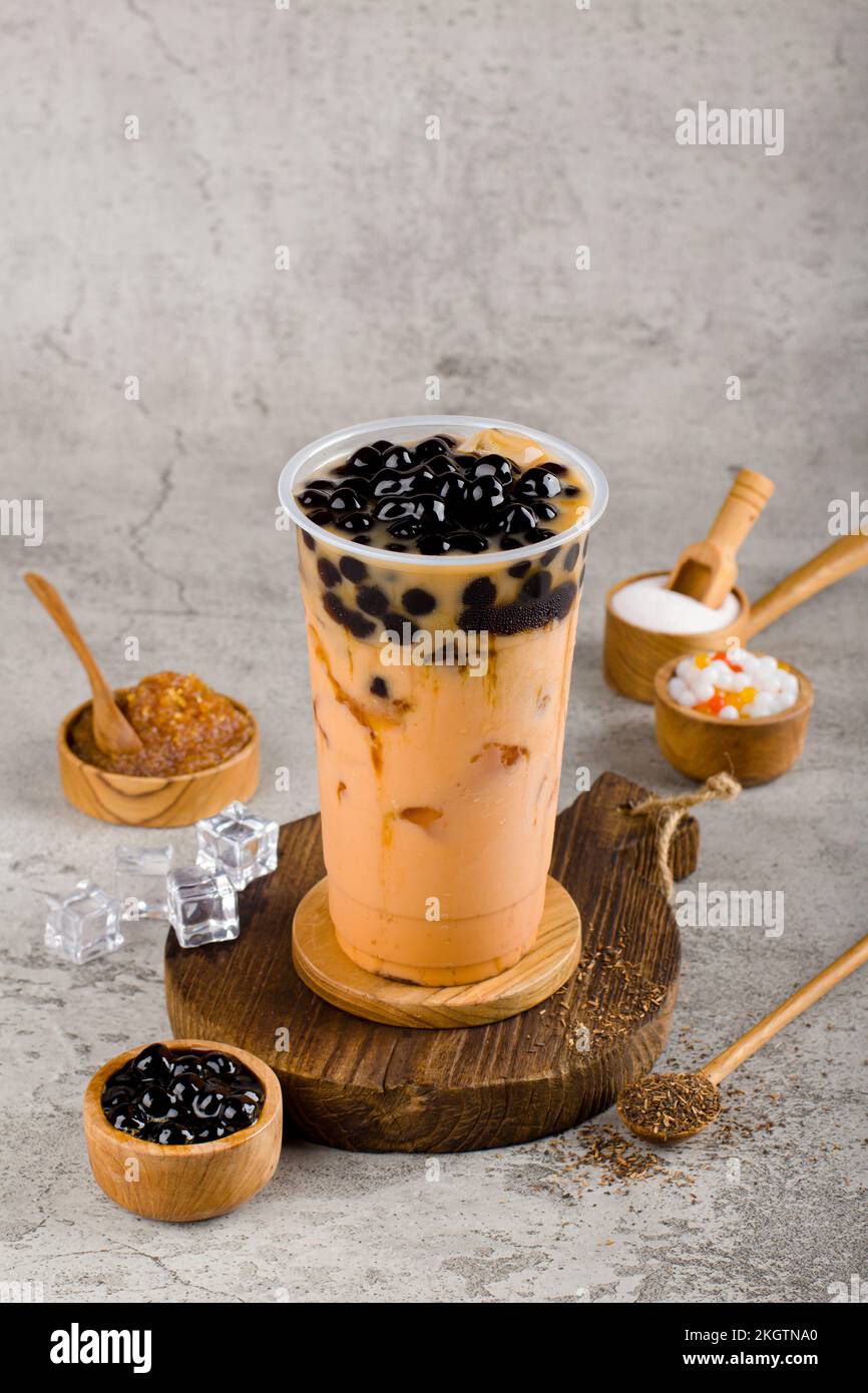 Boba or tapioca pearls is taiwan bubble milk tea in plastic cup with ...