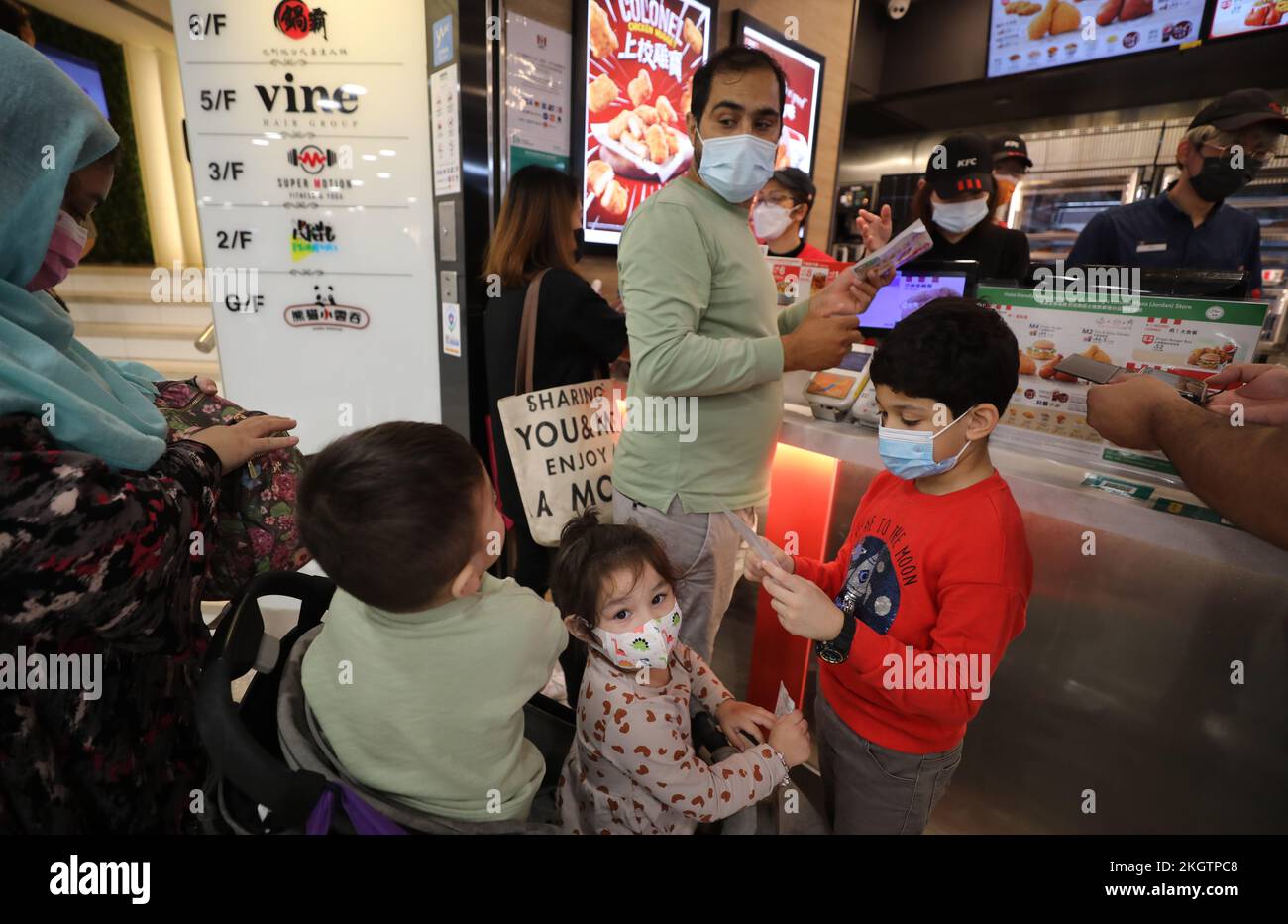 A Muslim family buys her first halal-certified KFC meal at KFC ChuangHH ...