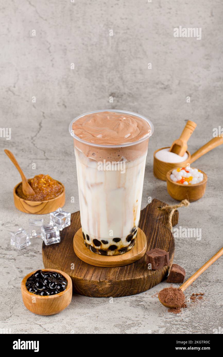 Boba or tapioca pearls is taiwan bubble milk tea in plastic cup with ...
