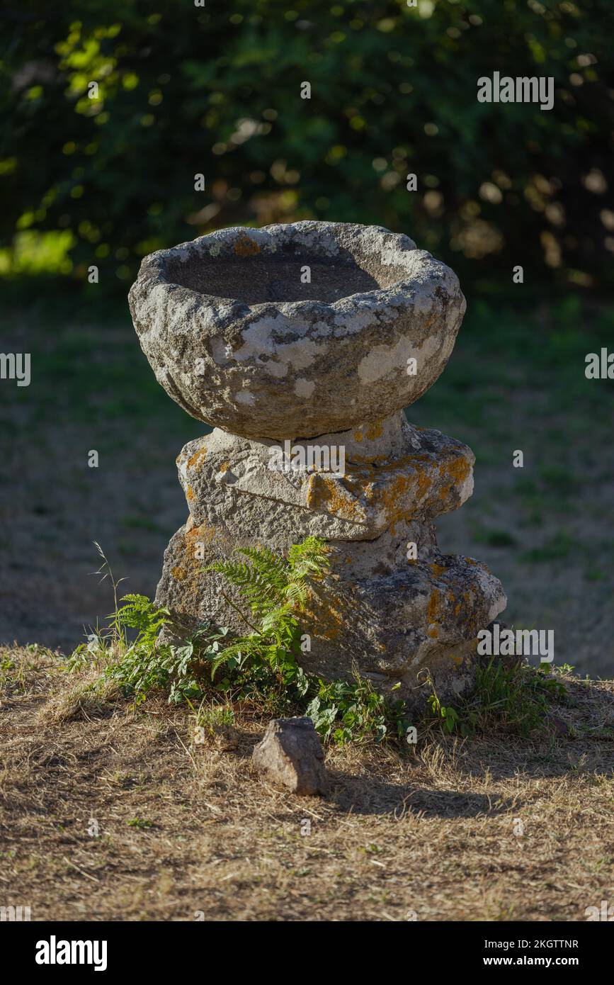 Ancient stone baptismal font in Lira, Galicia, Spain Stock Photo - Alamy