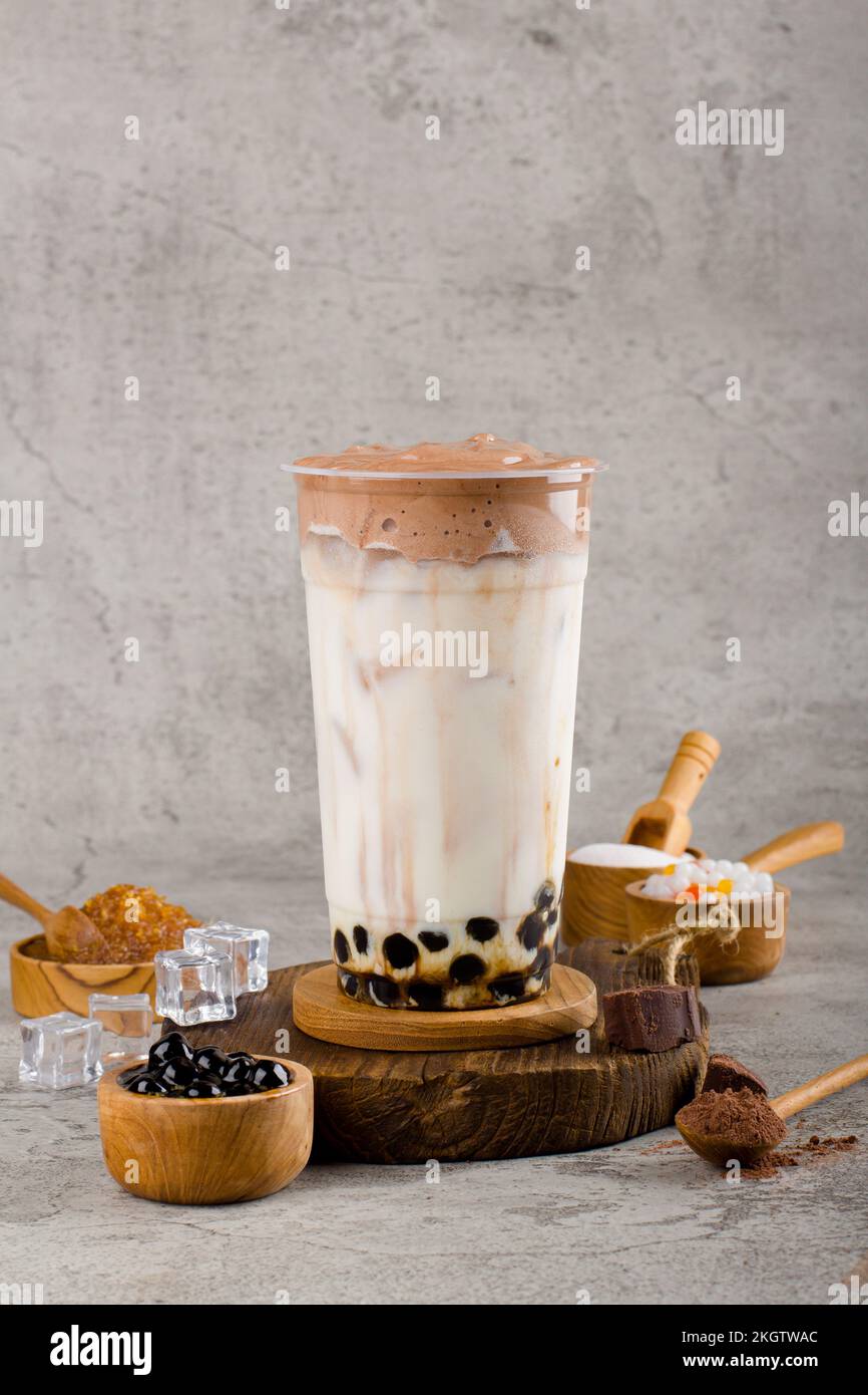 Boba or tapioca pearls is taiwan bubble milk tea in plastic cup with ...