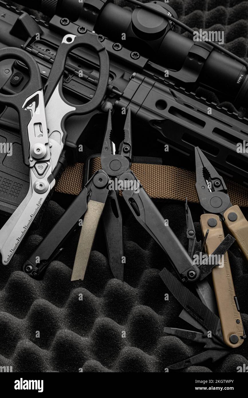 Modern multitool with many tools. A portable multi-tasking military ...