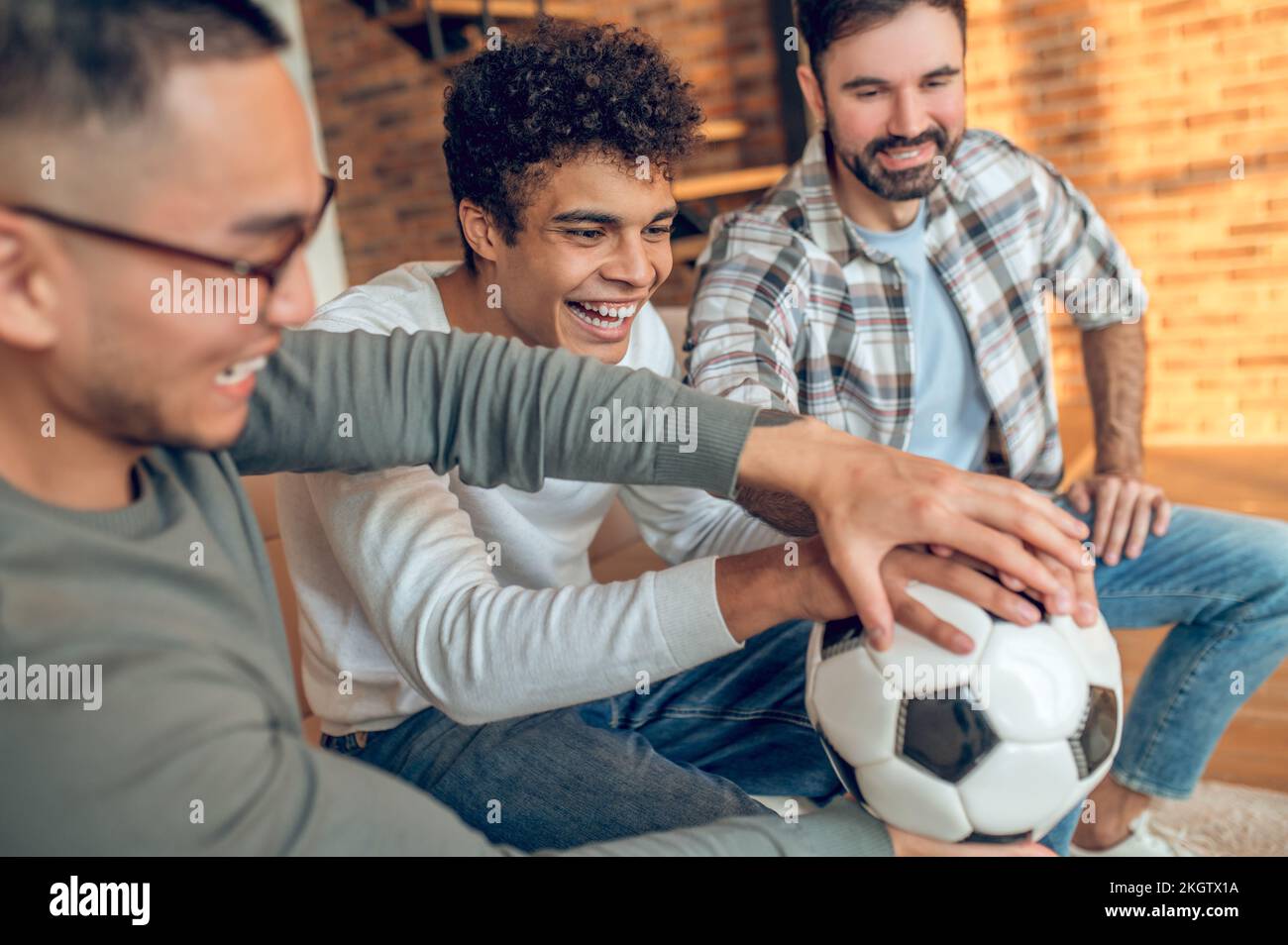 Football together hi-res stock photography and images - Alamy