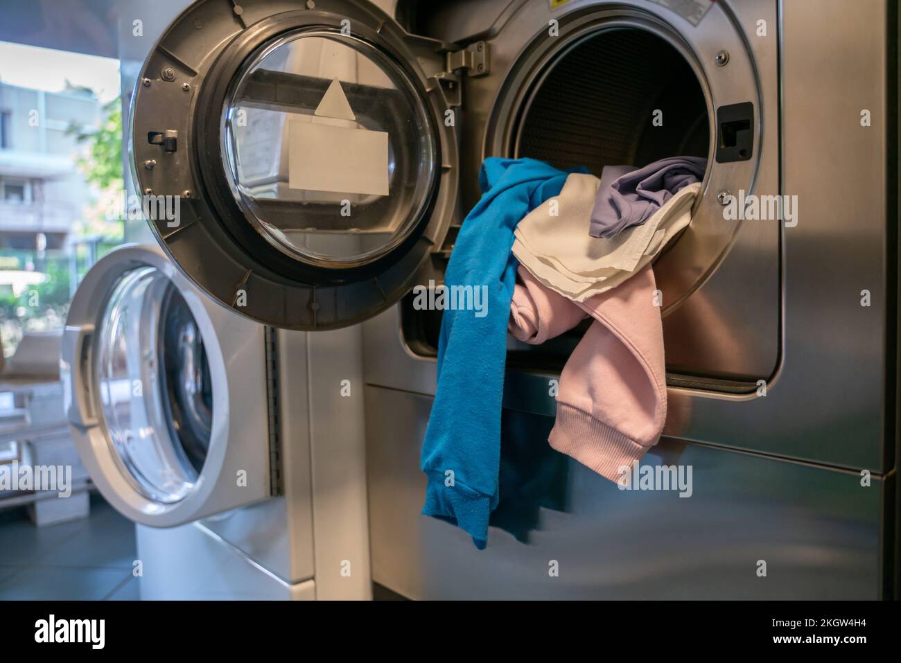 Front-load washers in a communal self-service laundry Stock Photo - Alamy