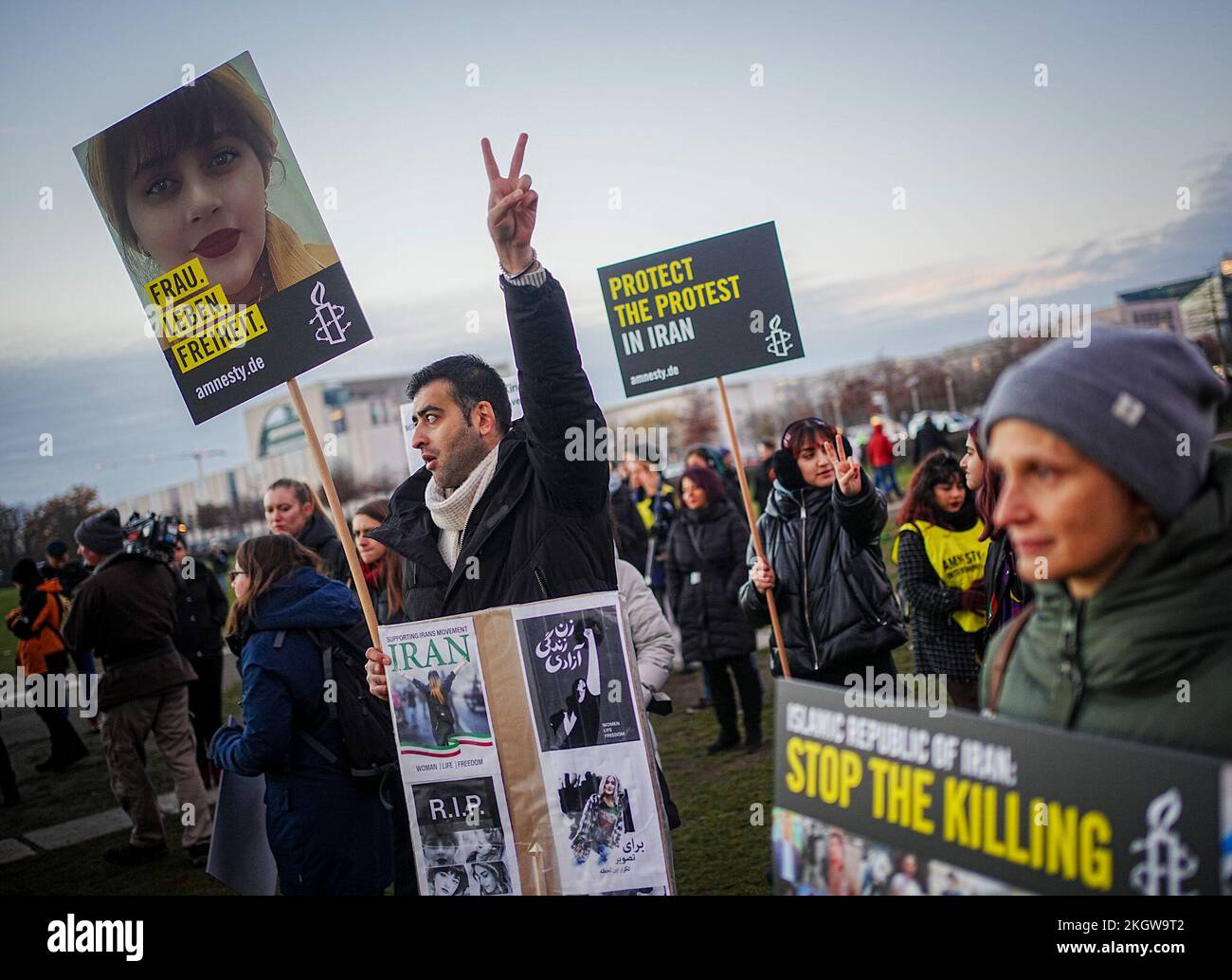 Berlin, Germany. 23rd Nov, 2022. Participants protest in front of the ...