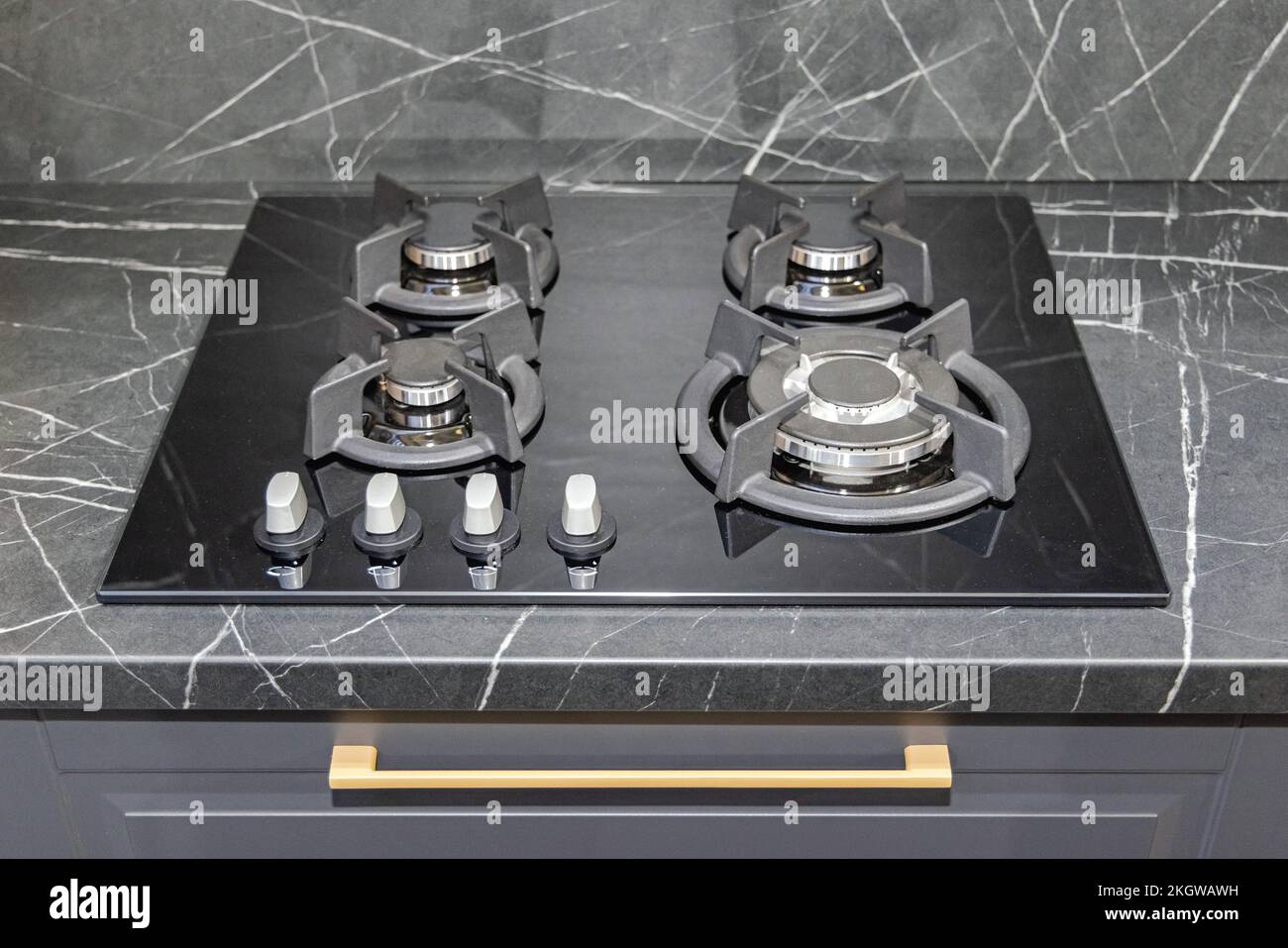 Gas Hob Cooktop Stove at Marble Kitchen Counter Stock Photo - Alamy