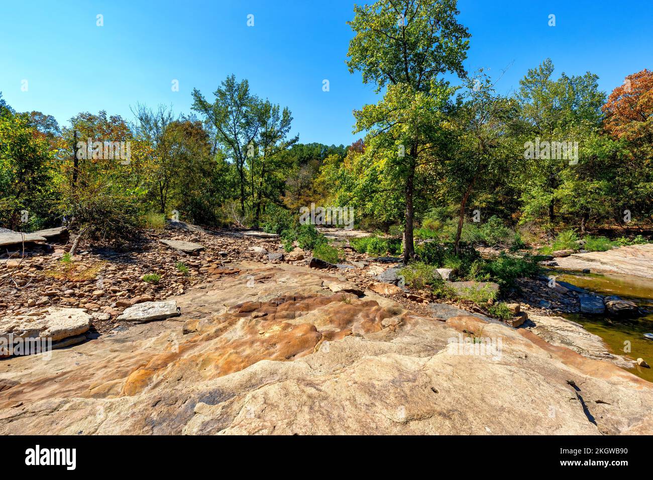 A nearly dry river bed on the other side of Natural Dam .A rock ...