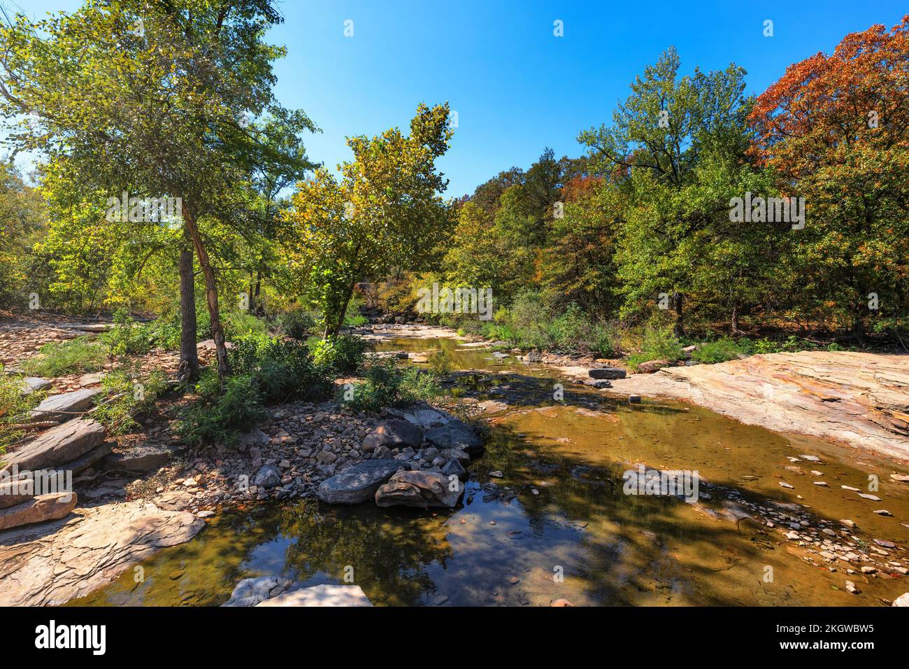 Nearly dry river bed on the other side of the Natural Dam. A rock ...