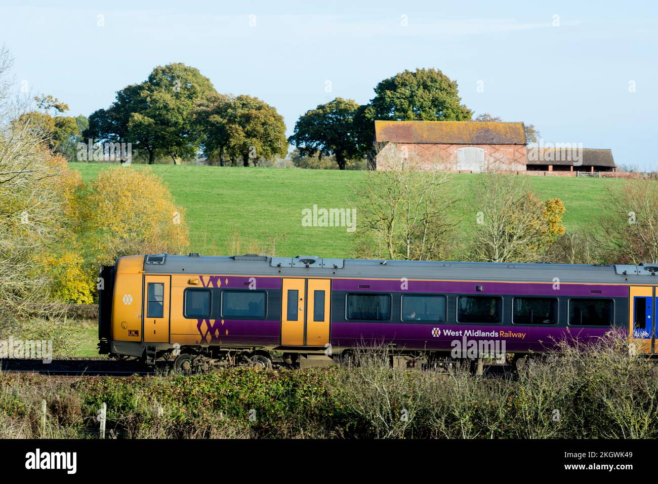 West Midlands Railway diesel train, side view in autumn, Warwickshire ...