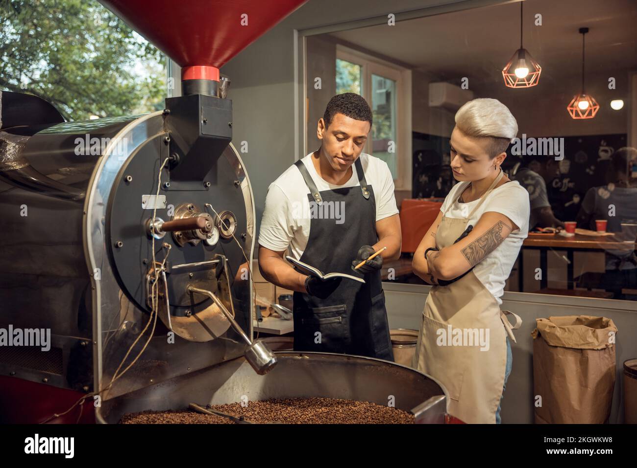 Working roasting coffee machine hi-res stock photography and images - Alamy