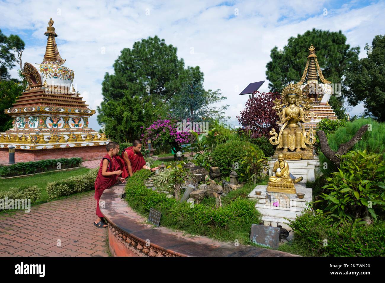 Young monks in the courtyard of the Tibetan Buddhist monastery of Kopan ...