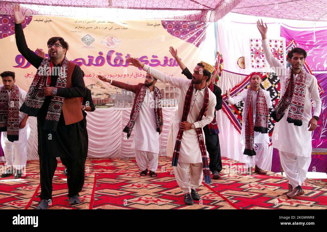Students are presenting tableaus on stage during a ceremony on the eve ...