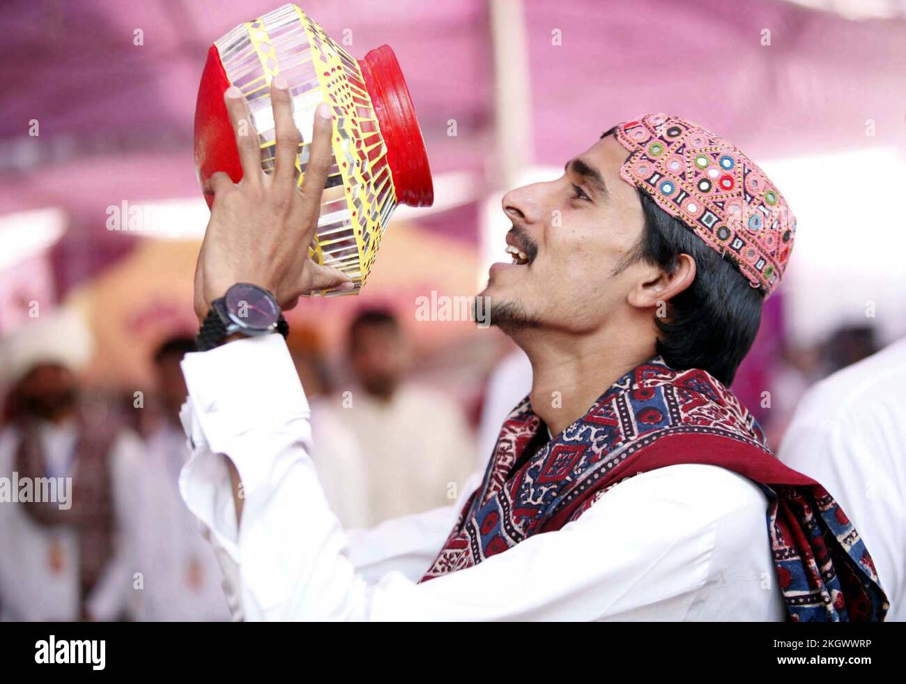 Students are presenting tableaus on stage during a ceremony on the eve ...
