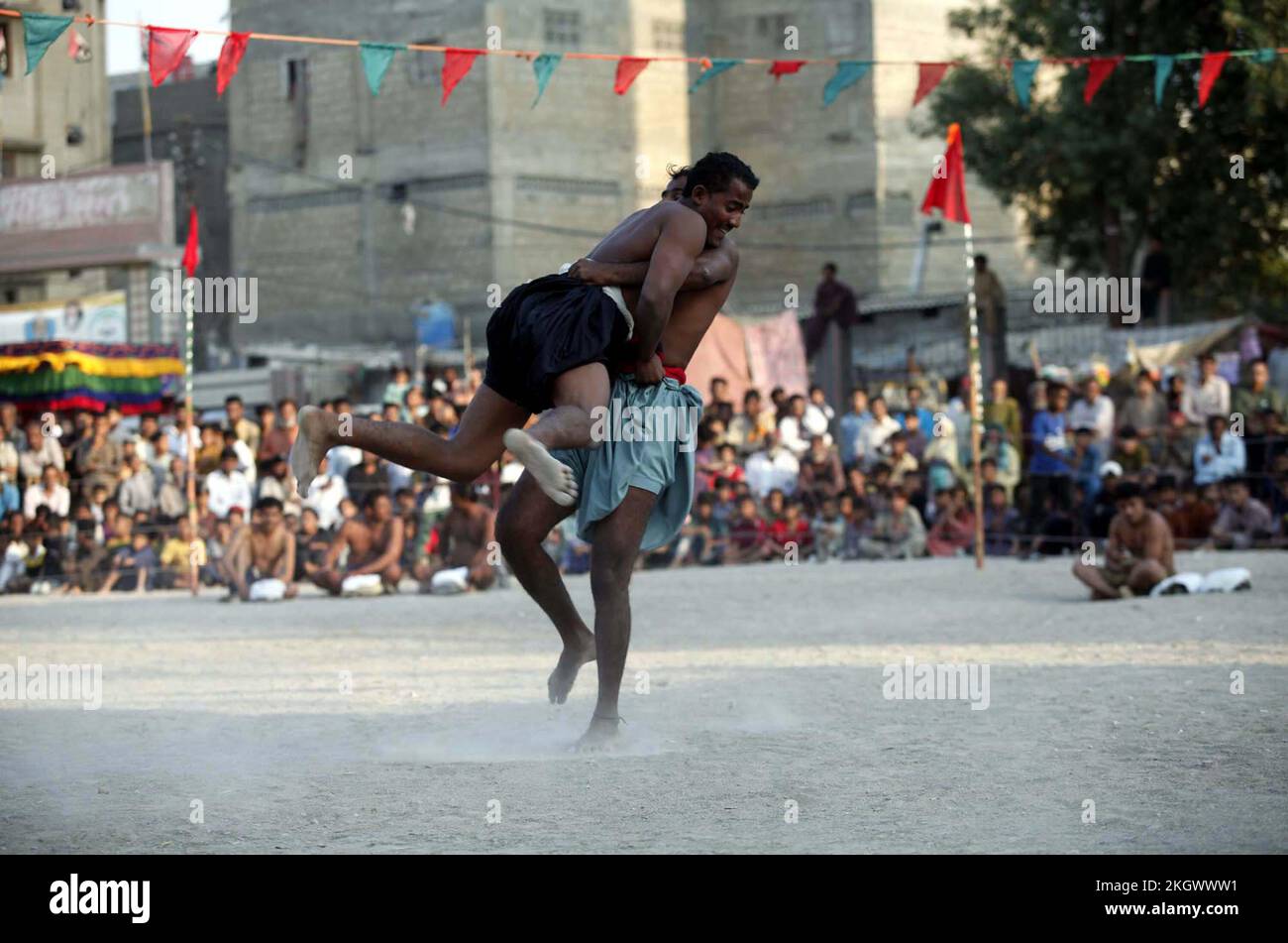 Wrestlers in action during the Sindh traditional wrestling Malh on the ...