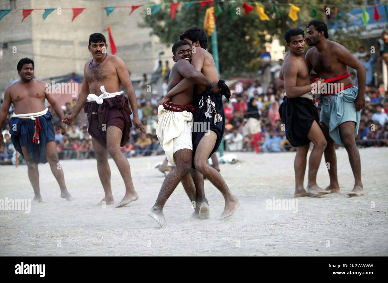 Wrestlers in action during the Sindh traditional wrestling Malh on the ...