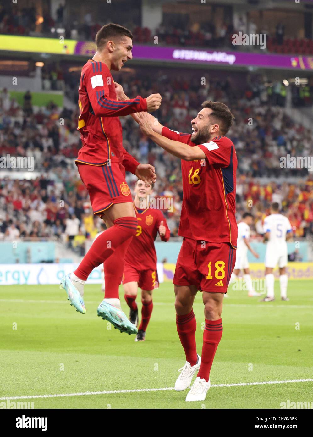 Doha, Qatar. 23rd Nov, 2022. Ferran Torres (L), Jordi Alba of Spain ...
