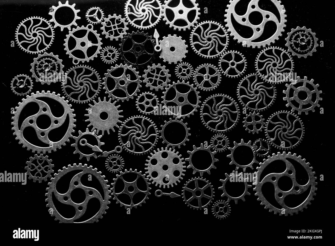 Cogs and wheels in monochrome Stock Photo - Alamy