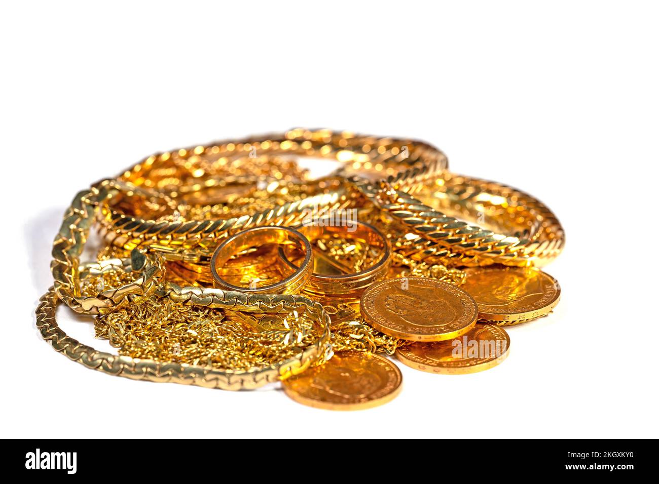 Gold jewelry, gold coins and gold bars against white background Stock ...