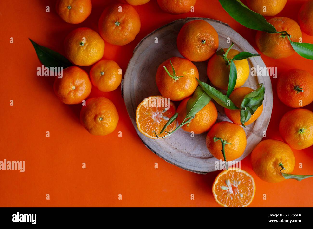 Top view of ripe fresh mandarins or tangerine orangers with green ...