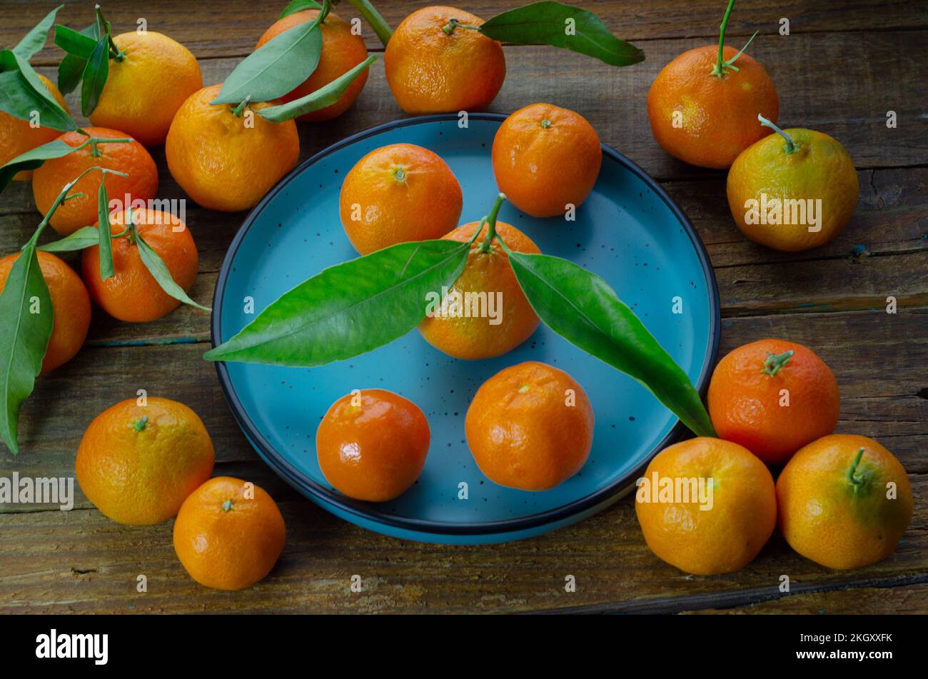 Top view of ripe fresh mandarins or tangerine orangers with green ...