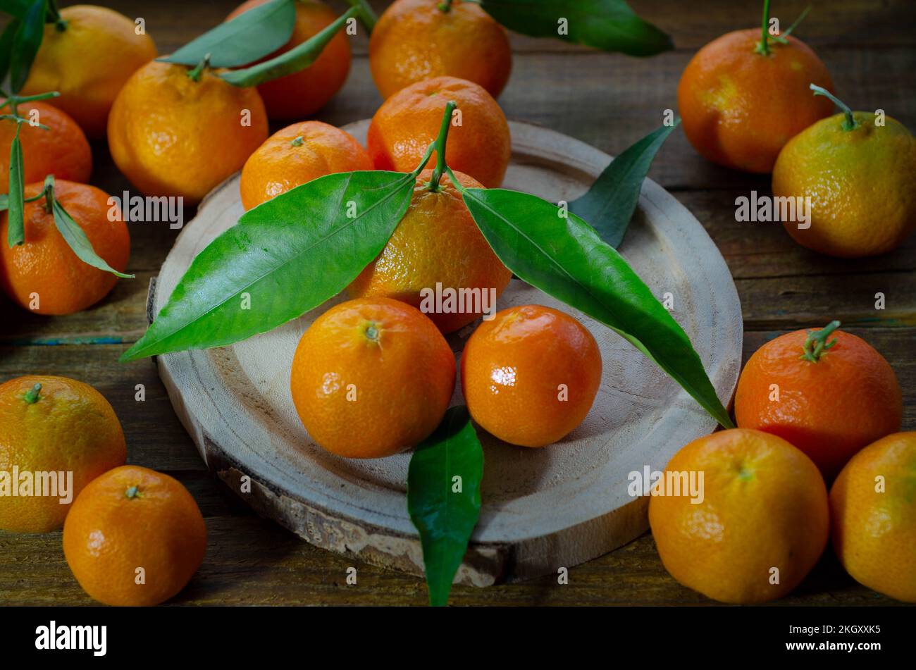 Top view of ripe fresh mandarins or tangerine orangers with green ...