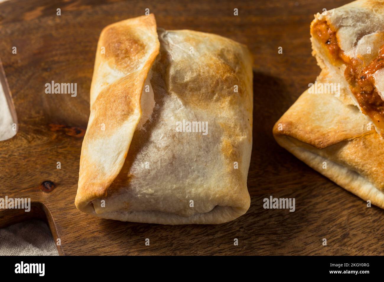 Homemade Fast Food PIzza Puff Pocket with Cheese and Meat Stock Photo ...