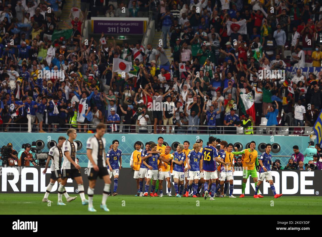Doha, Qatar. 23rd Nov, 2022. Ritsu Doan of Japan is congratulated by ...